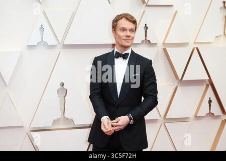 Alfie Allen arrives at the Oscars on Sunday, Feb. 9, 2020, at the Dolby ...