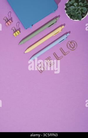 Stationery and paper with text LEARN ENGLISH on color background ...