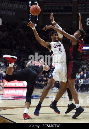 Houston's Fabian White Jr. (35) shoots as Tulsa's Isaiah Hill (4 ...