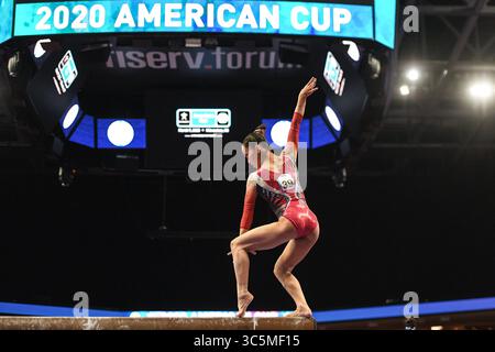 Hitomi Hatakeda, of Japan, performs on the beam during women's artistic ...