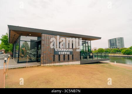 Toyama, Japan - 10 may 2025 Starbucks in Fuganuga Kansui Park . High ...