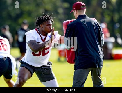 Washington Commanders running back Jacory Croskey-Merritt (32) scores a ...