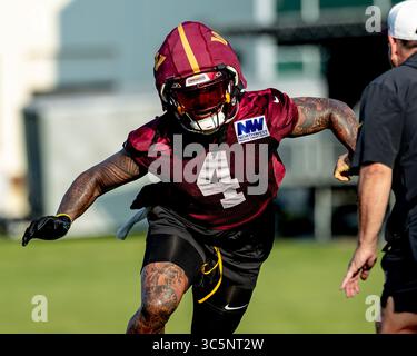 Washington Commanders linebacker Frankie Luvu (4) reacts during the ...