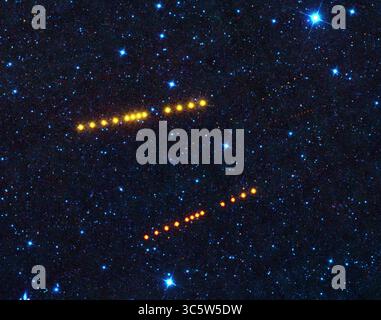 Asteroids Klotho and Lina, NEOWISE image Stock Photo - Alamy