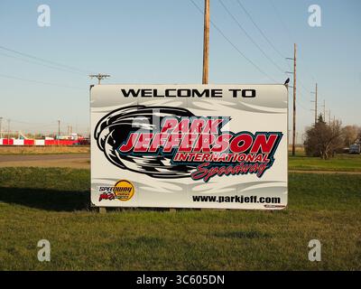Fans sit in social distance squares during a spring training baseball ...
