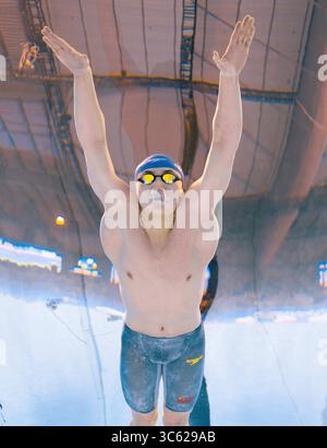 Chen Juner of China competes in the men's 200m butterfly semifinal at ...