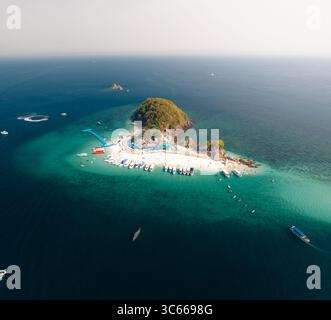 Aerial view of a vibrant Khai Nai Island, where turquoise waters meet ...