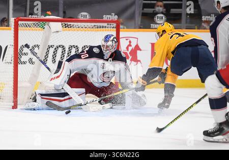 Nashville Predators left wing Cole Smith (36) warms up prior to facing ...