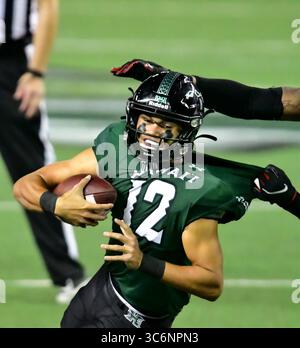 Hawaii quarterback Chevan Cordeiro (12) during an NCAA football game ...