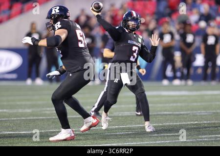 Ottawa RedBlacks quarterback Dru Brown #3 throws the ball in the second ...