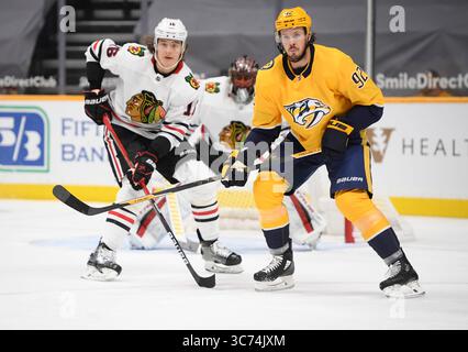 Chicago Blackhawks defenseman Nikita Zadorov (16) handles the puck ...