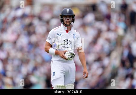 England’s Jacob Bethell walks off the field after being dismissed on ...