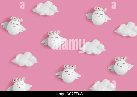White cotton cloud with Easter eggs on blue background. Minimal spring ...
