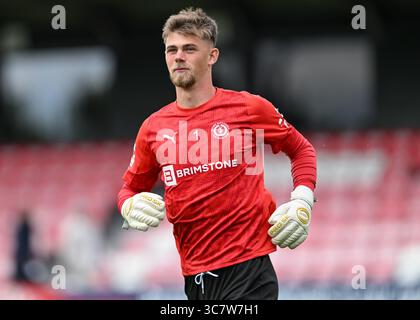 Tom Booth, Goalkeeper of Crewe Alexandra applauds the fans during the ...