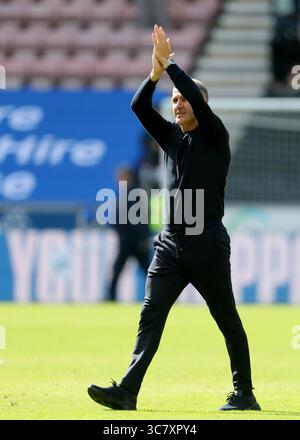 Wigan Athletic Manager Ryan Lowe applauds the fans during the Lincoln ...