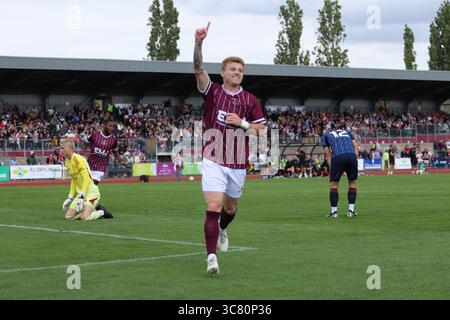Jack Barham, of Chelmsford City, celebrates the goal of Louie Kudiabor ...