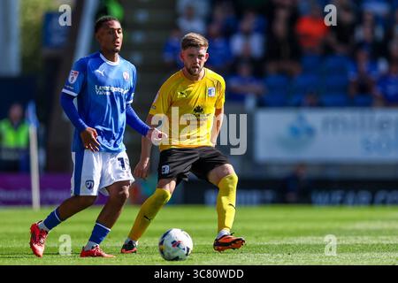 Barrow's Ben Jackson in action with Cambridge United's McConnell during ...