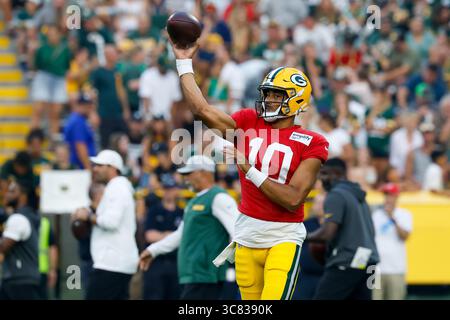 Green Bay Packers quarterback Jordan Love (10) runs with the ball ...