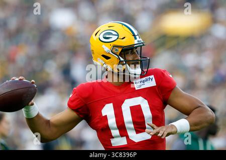 Green Bay Packers quarterback Jordan Love (10) runs with the ball ...