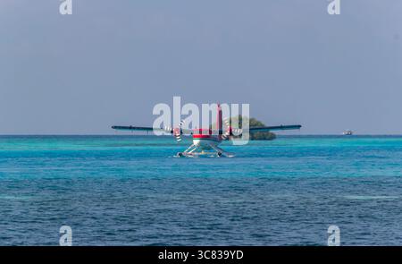 Seaplane prepares for takeoff on turquoise water Stock Photo - Alamy
