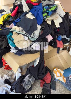Large Pile of Second Hand Clothes at Flea Market Stock Photo - Alamy