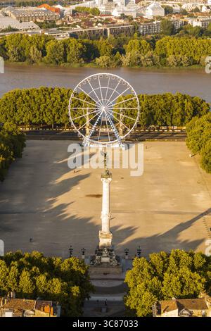 Aerial view of the Quinconces Square with its monument and the Garonne ...