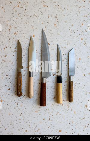 A set of high quality kitchen knives on a cutting board Stock Photo - Alamy