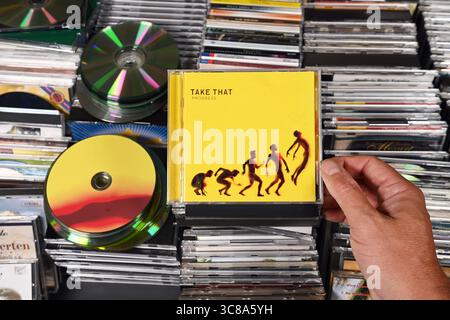 Take That Progress album on compact disc or CD Stock Photo - Alamy