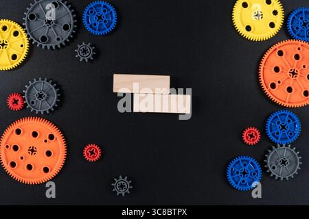 Plastic toy blocks on black background Stock Photo - Alamy