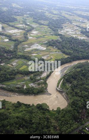 Kali Progo River that crosses through the fertile rice fields and ...