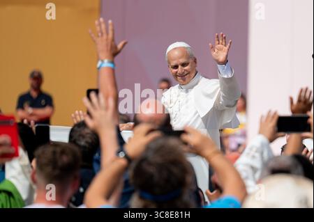 Pope Leo XIV arrives for a Mass at the Gran Canaria Stadium in Las ...