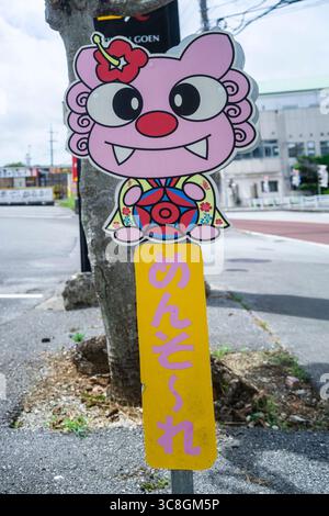 Traffic sign with shisa lion in Okinawa/Japan Stock Photo - Alamy