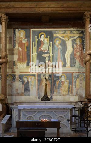 Romanesque altar with 13th-century twisted columns and frescoes by the ...