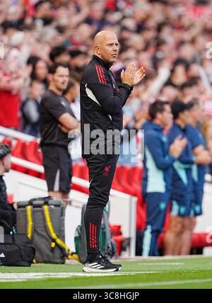 Arne Slot manager of Liverpool claps fans after the UEFA Champions ...