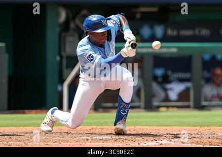 Kansas City Royals' Tyler Tolbert celebrates after scoring on a ...