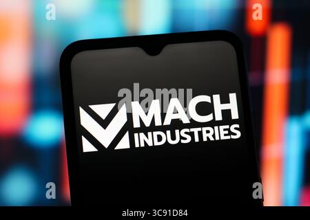 In this photo illustration, the Mach Industries logo is seen displayed ...