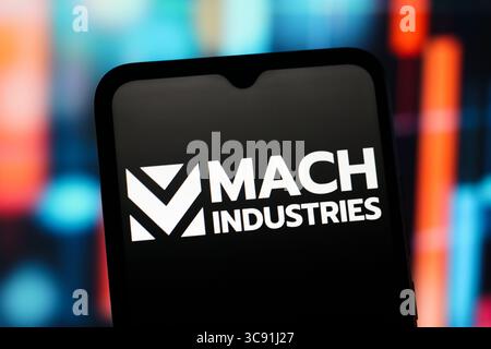 In this photo illustration, the Mach Industries logo is seen displayed ...
