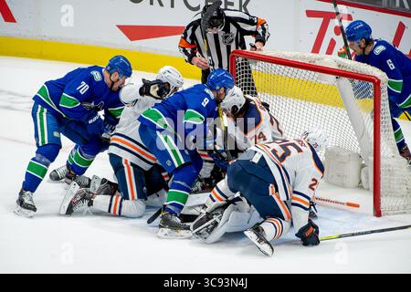 Vancouver Canucks and Edmonton Oilers players rough it up after Canucks ...
