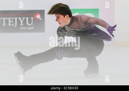 Douglas Gerber of Australia performs during the men's short program at ...