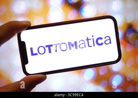 In this photo illustration, a Lottomatica Group company logo is seen ...