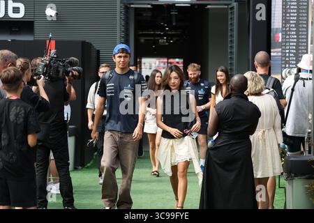 Alexander Albon of Williams with girlfriend Lily Muni He during the ...