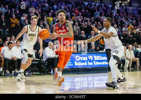 Clemson guard Brevin Galloway (11) celebrates with forward Ben ...