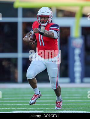 Liberty quarterback Johnathan Bennett (11) passes the ball during the ...