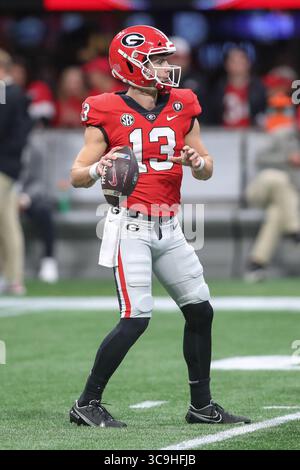 December 03, 2022: Georgia receiver Ladd McConkey (84) tries to get ...