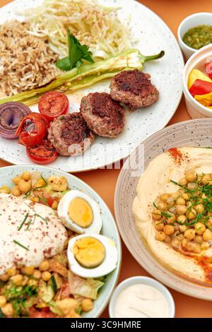 Healthy Mediterranean salad with vegetables and grains Stock Photo - Alamy