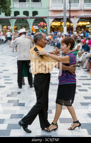 A couple dance to danzón music at a public park in Mexico City Stock ...