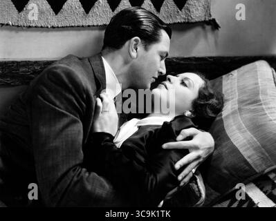 Robert Young, Leila Hyams, on-set of the Film, "Saturday's Millions ...
