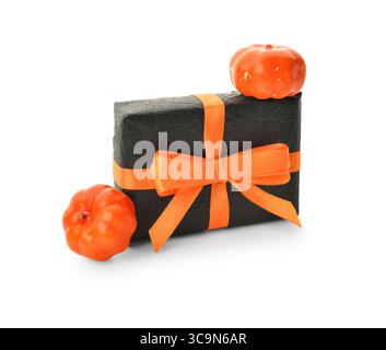 Halloween gift box with ribbon, pumpkins and and air balloons on wooden ...