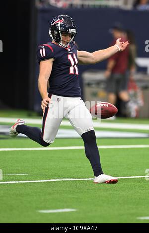 Houston Texans punter Cameron Johnston (11) punts the ball during an ...