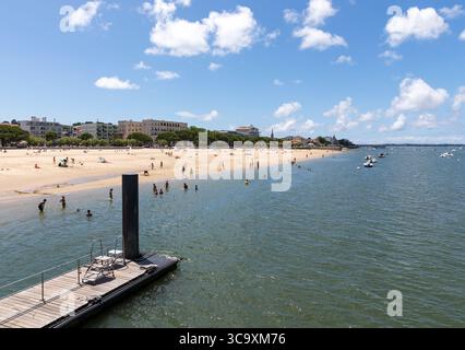 Arcachon, France – June 26, 2025: People sunbathing at the beach south ...